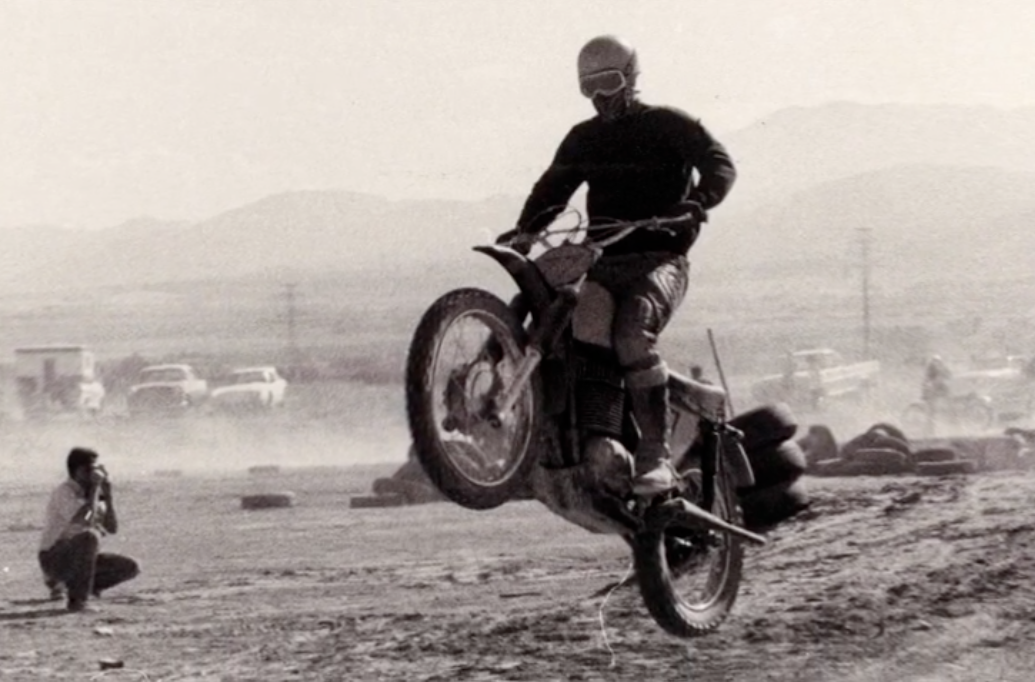 Dean Perkins engaged in his hobby of riding motorcycles, circa 1955 ...